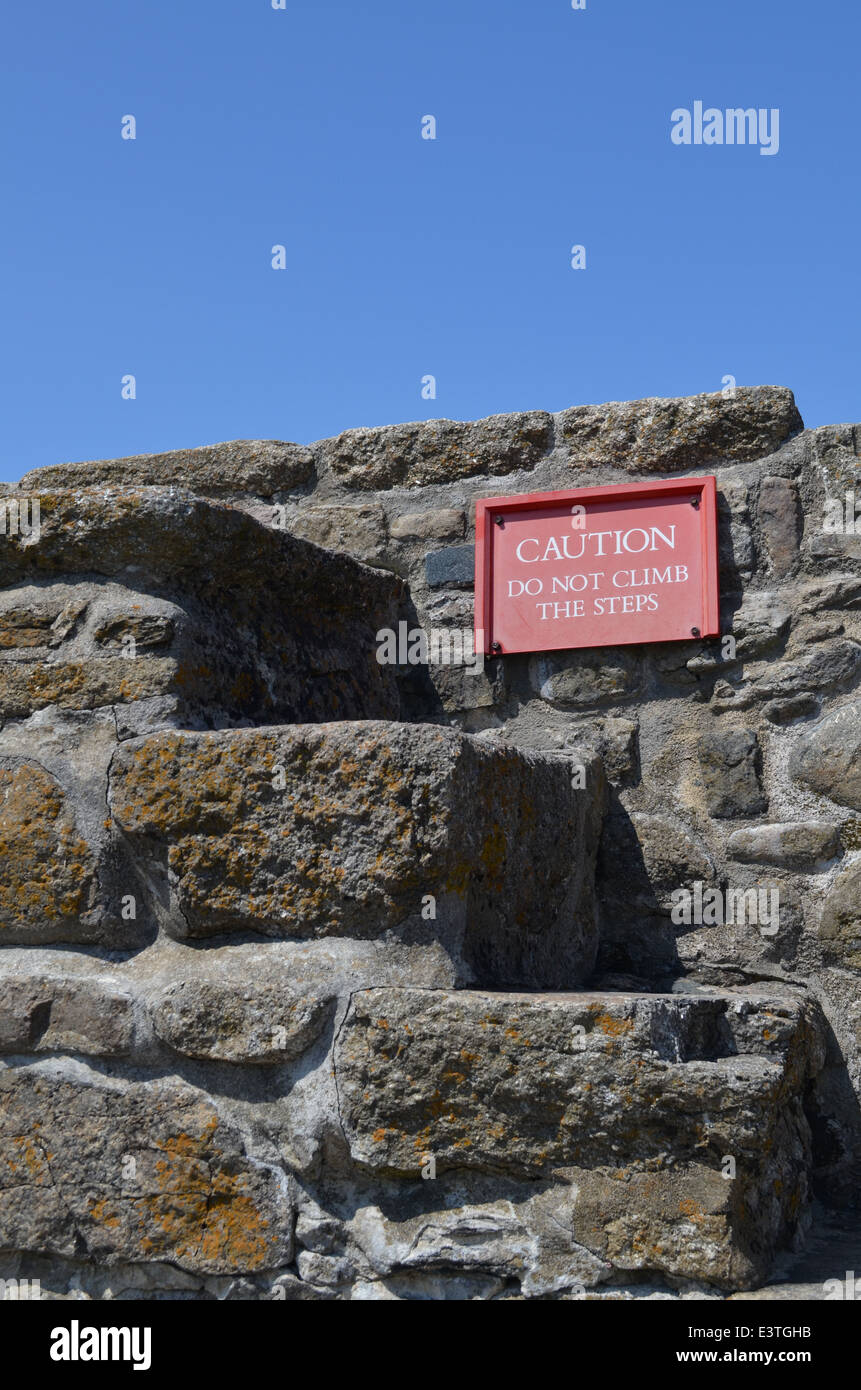 Caution do not climb the steps sign Stock Photo - Alamy