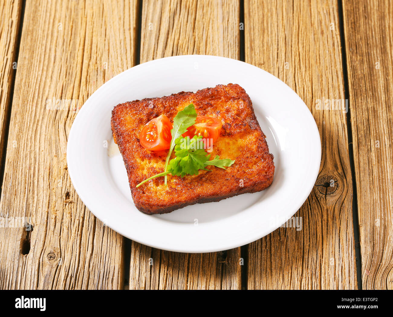 French toast - Bread soaked in beaten eggs and then fried Stock Photo ...