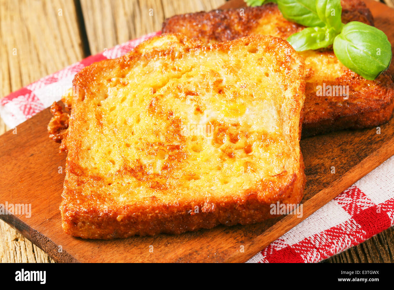 French toast - Bread soaked in beaten eggs and then fried Stock Photo ...