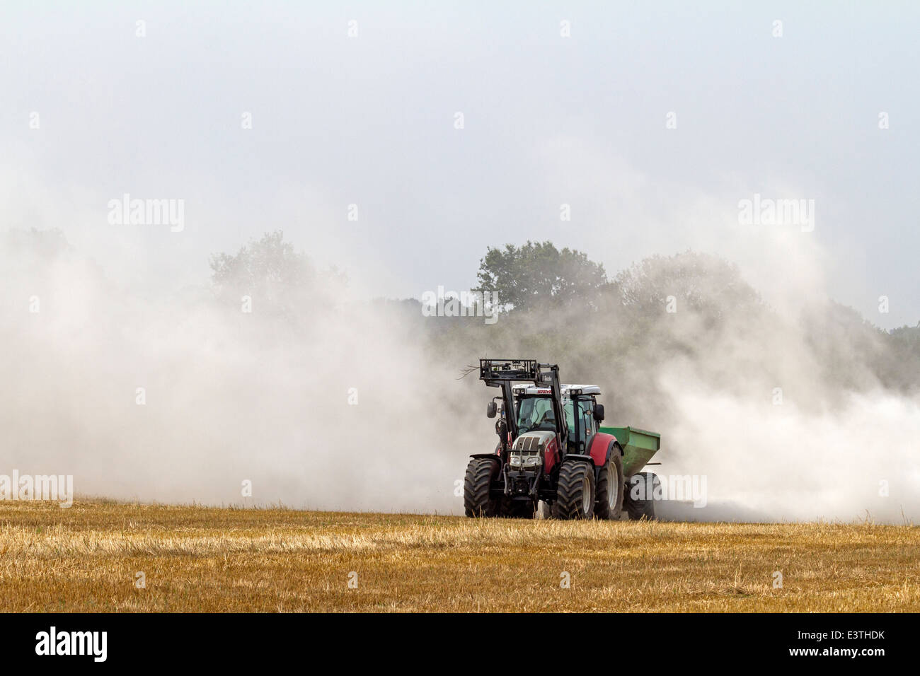 Tractor liming a field, Germany, Europe Stock Photo - Alamy