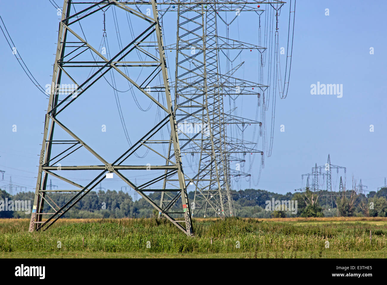 Power poles, Schleswig Holstein, Germany Stock Photo - Alamy