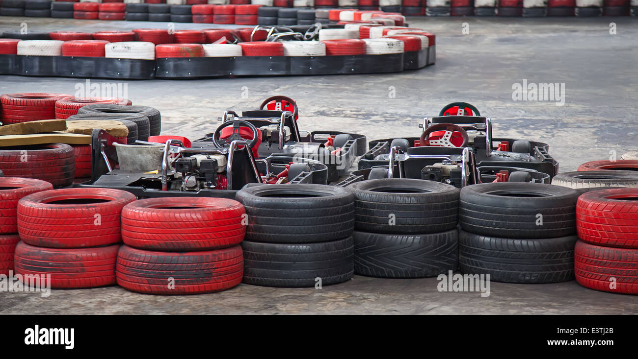 Indoor karting race (2 kart and safety barriers Stock Photo - Alamy