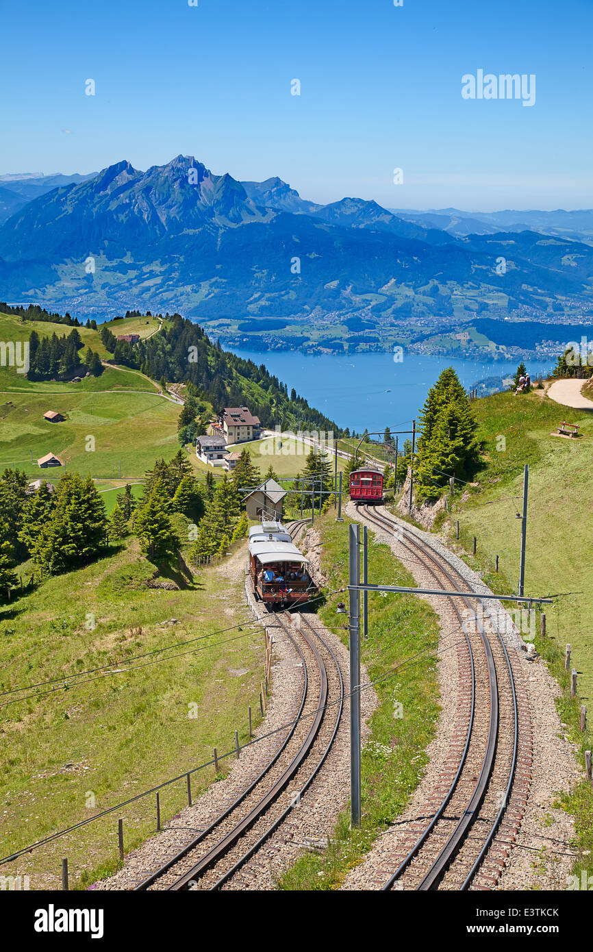 Swiss alpine cog railway train climbing up to the mount Rigi Stock ...