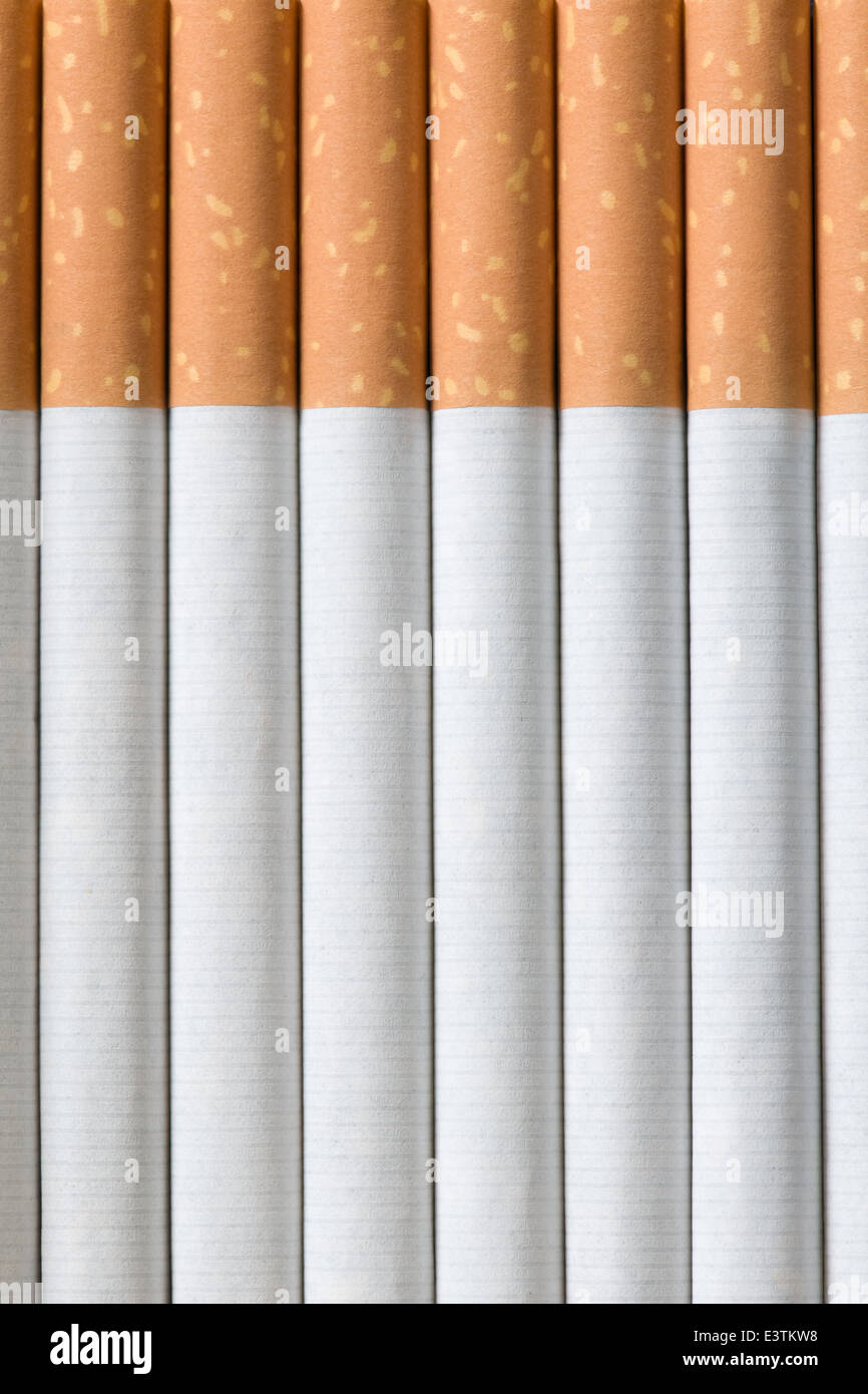 front close view of vertical cigarettes background Stock Photo - Alamy