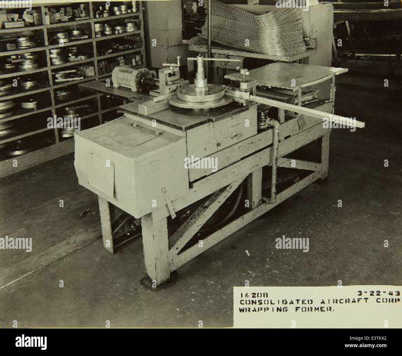 This image shows scenes from the Consolidated/Convair aircraft factory ...