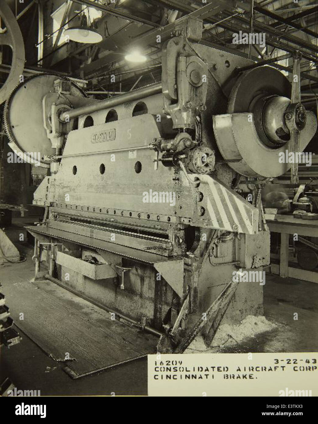 This image shows scenes from the Consolidated/Convair Aircraft Factory ...