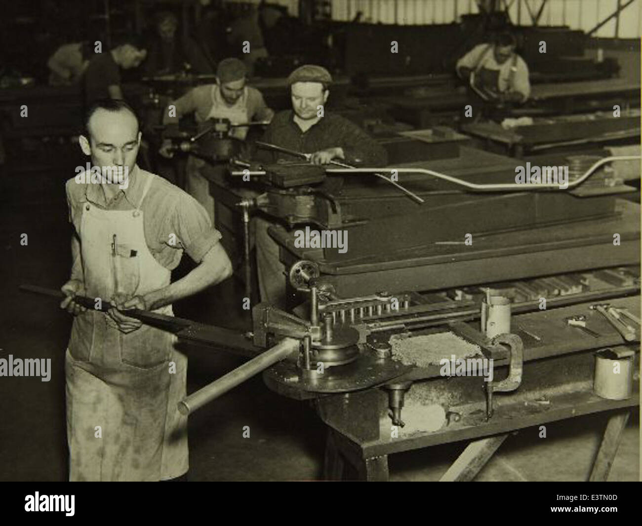 This image shows tube bending operations at the Consolidated/Convair ...