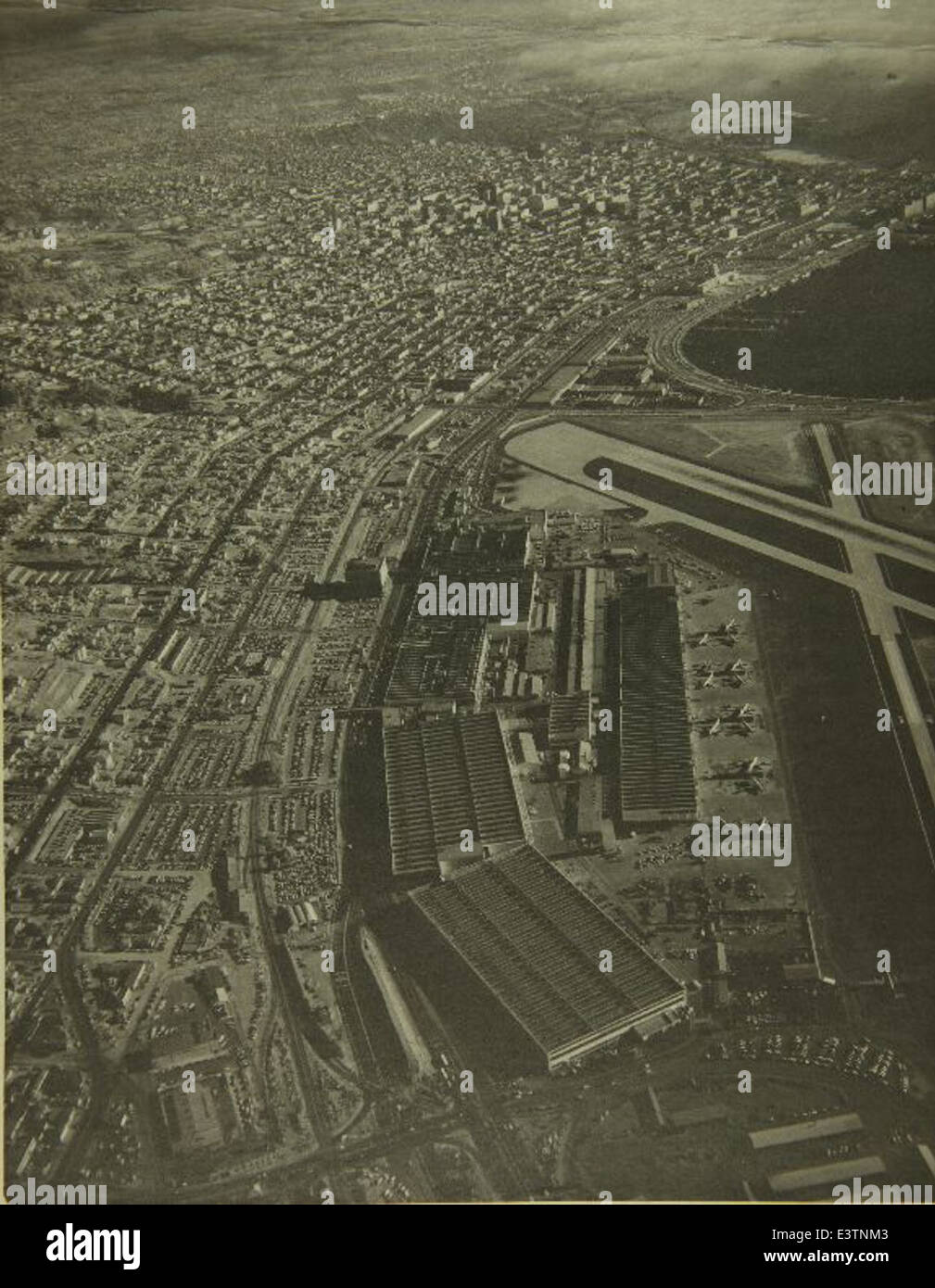 This aerial view captures the Consolidated/Convair aircraft factory and ...