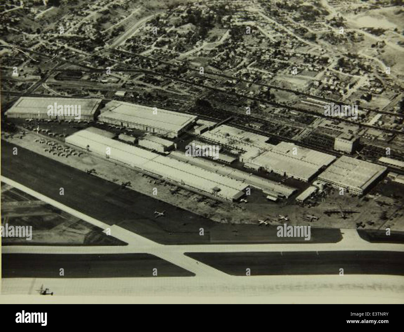 This aerial view captures the Consolidated/Convair aircraft factory in ...