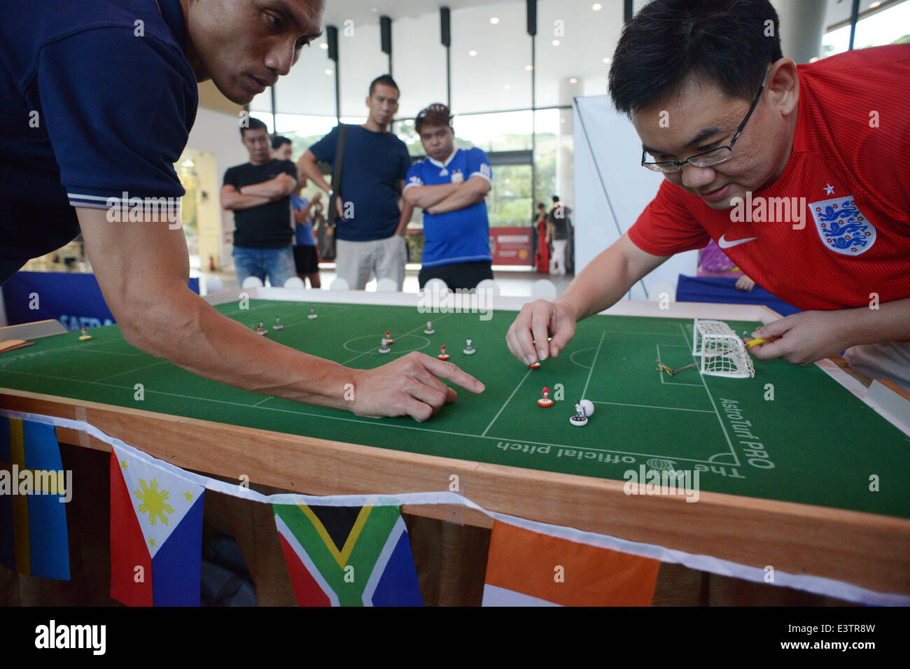 Singapore. 29th June, 2014. Table football enthusiasts participate in ...
