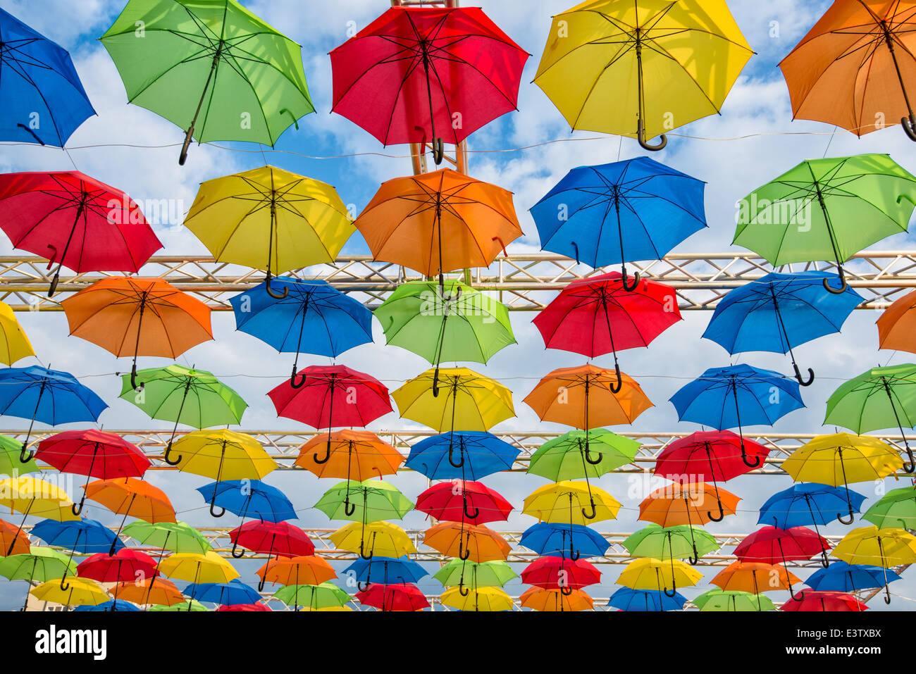 Many umbrellas coloring the sky Stock Photo - Alamy