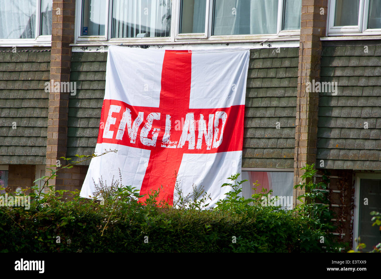 St Georges England flag on council house Stock Photo - Alamy