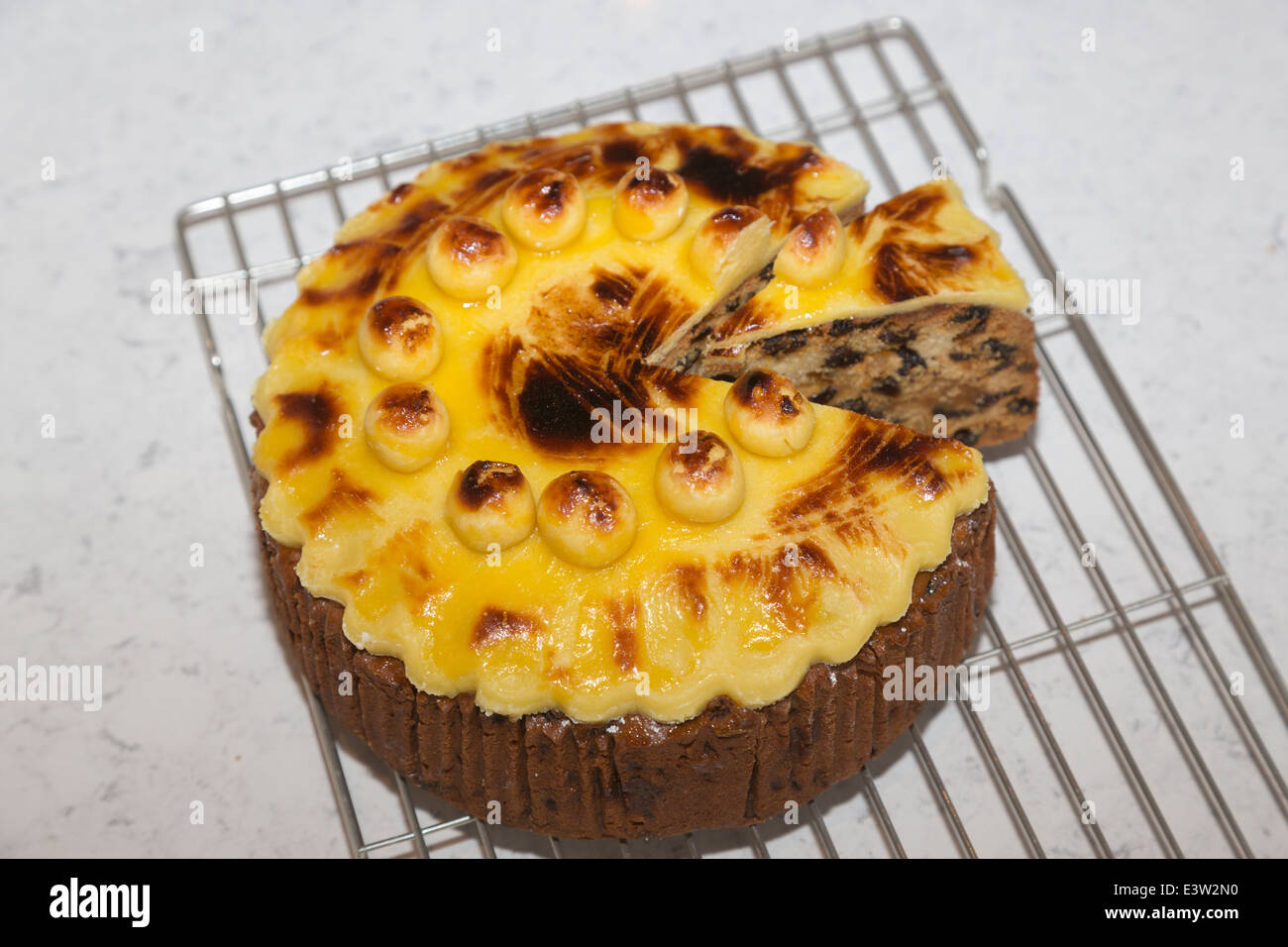 Traditional home baked, round Easter simnel cake, topped with marzipan ...