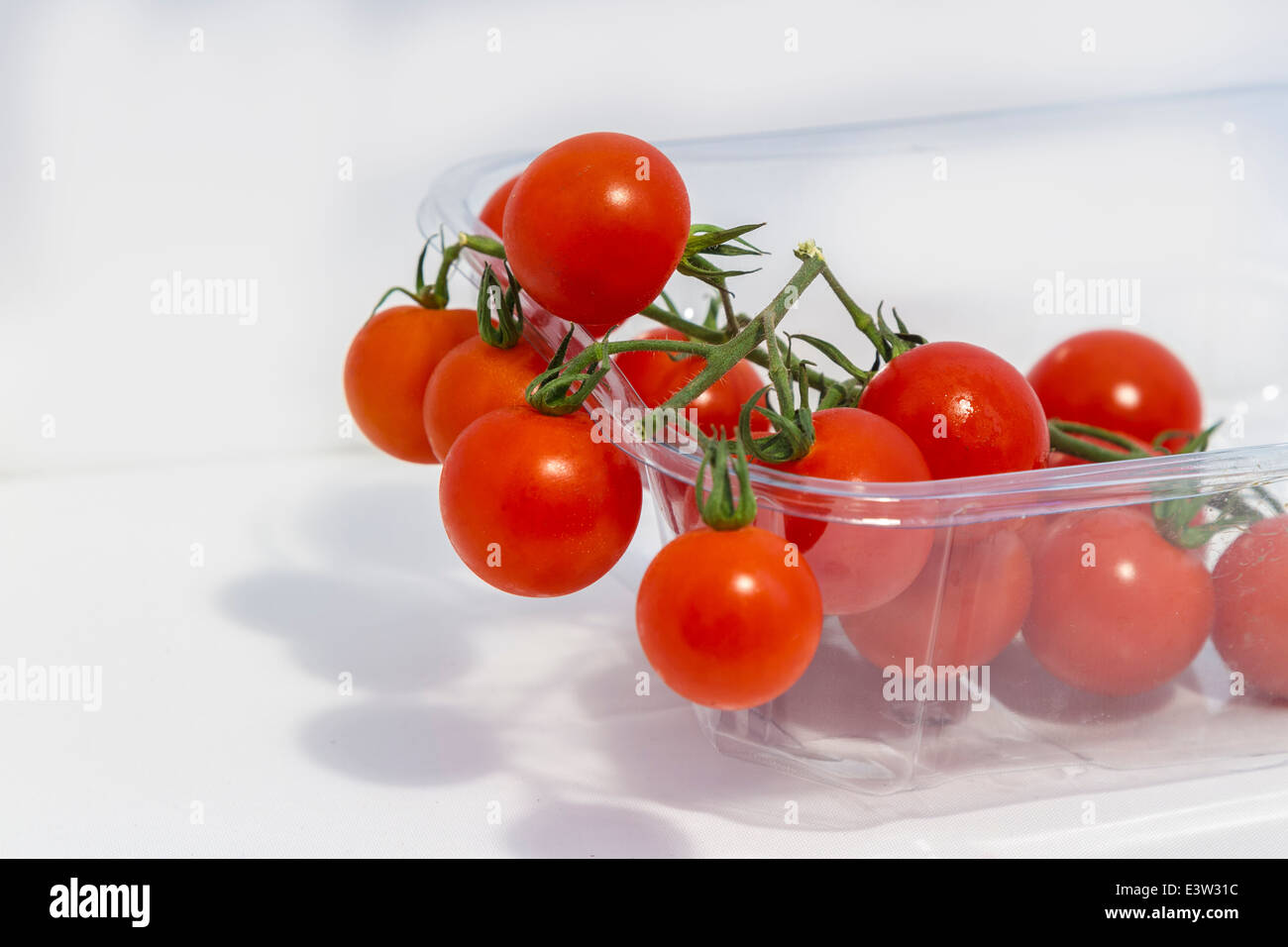 Cherry Tomatos in a plastic box from supermarket Stock Photo - Alamy