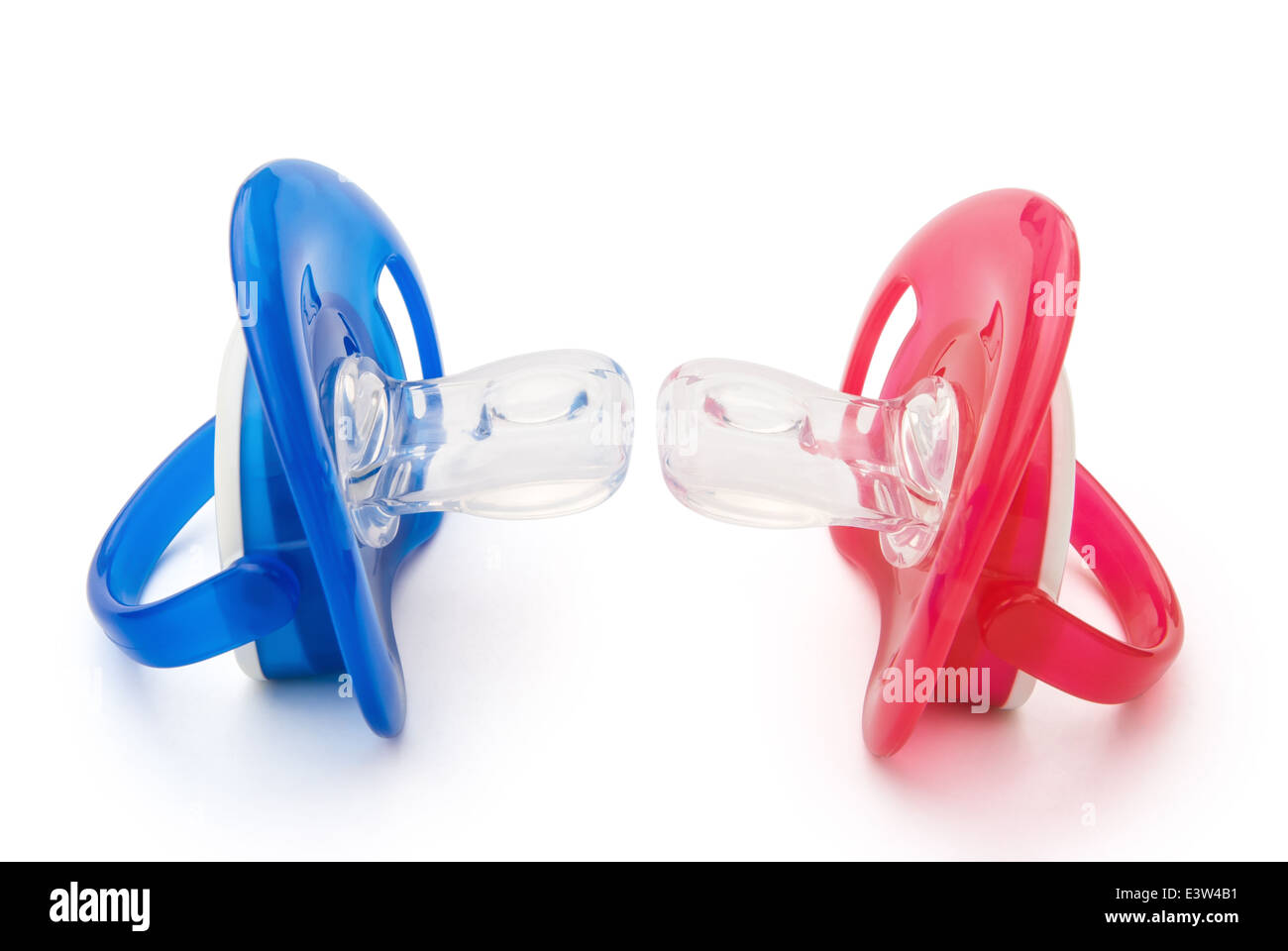 red and blue pacifiers isolated on white with clipping path Stock Photo ...