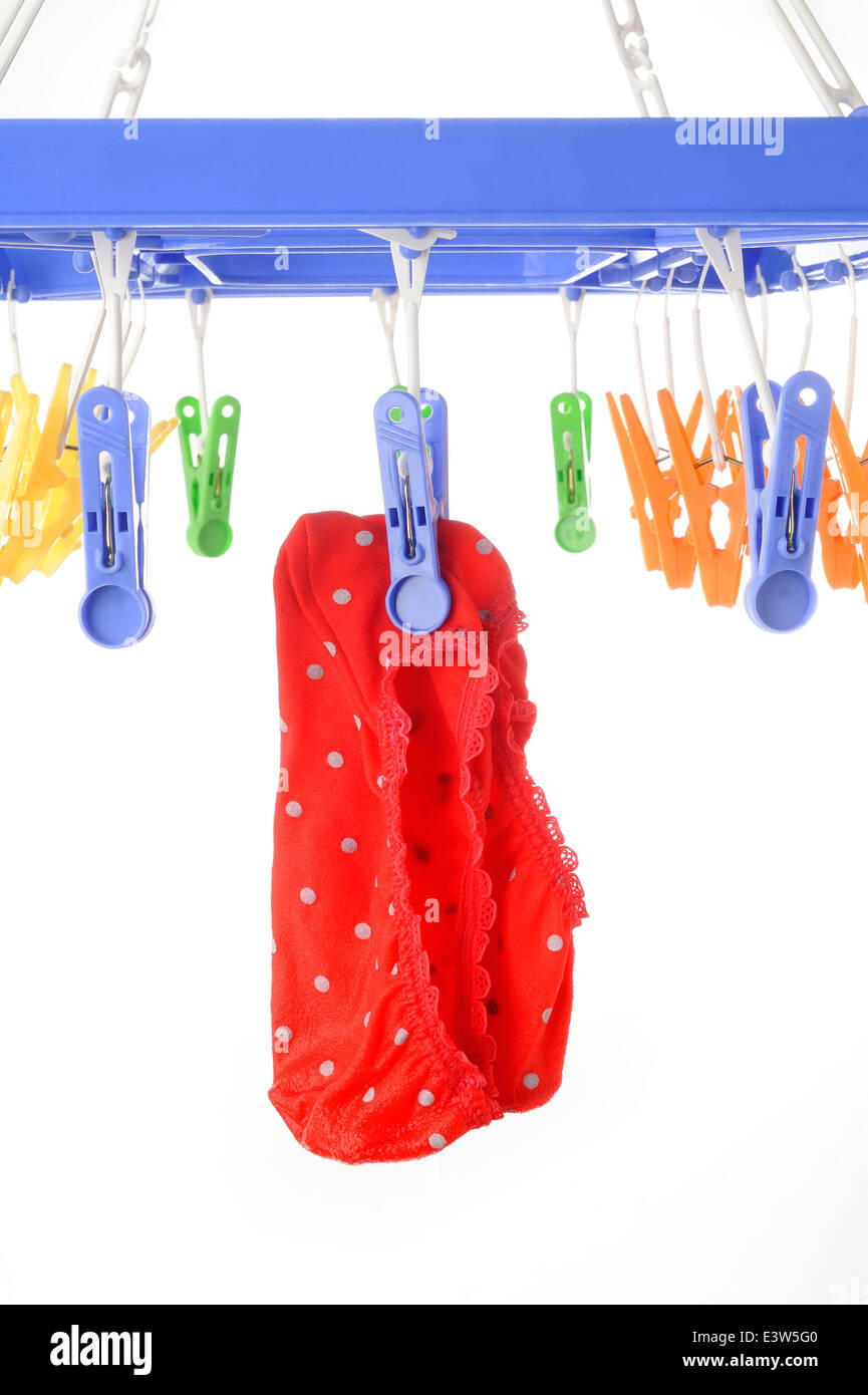 socks hanging on clothespin to dry Stock Photo - Alamy
