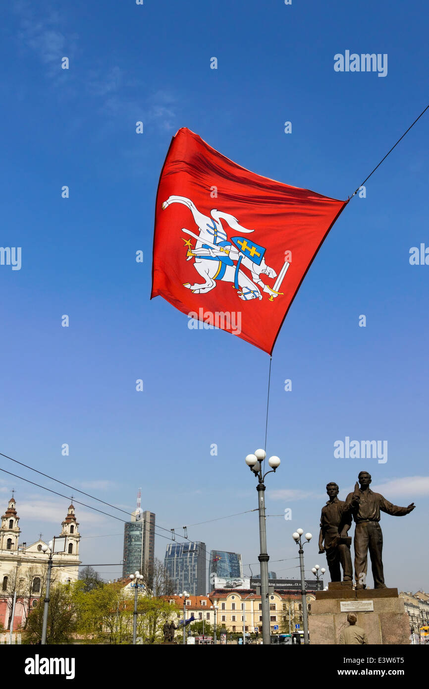 Coat of arms of the Republic of Lithuania on the red flag against the ...