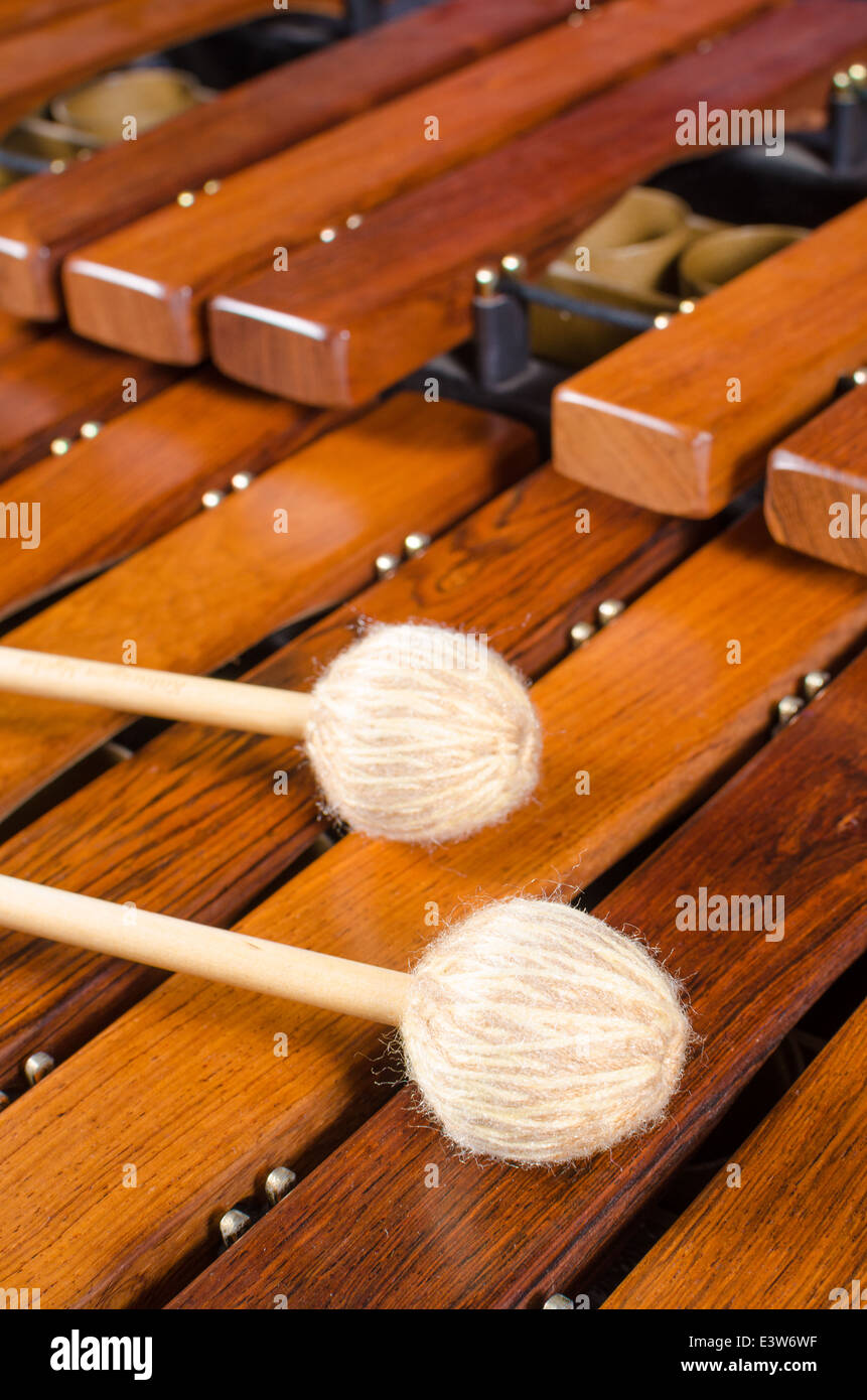 Full frame take of two mallets resting on the keys of a marimba Stock ...