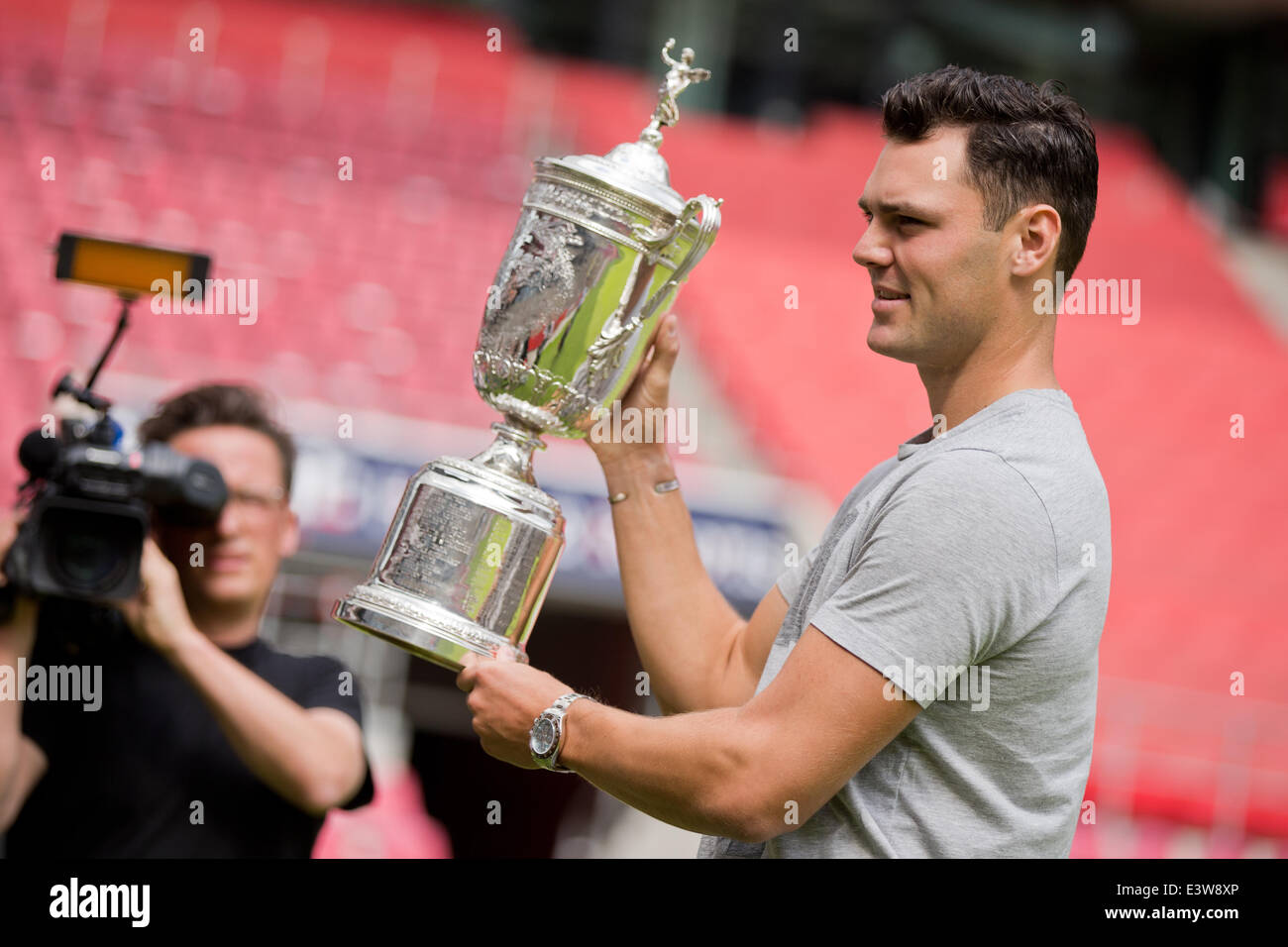 German golfer Martin Kaymer poses with his US Open trophy at the ...