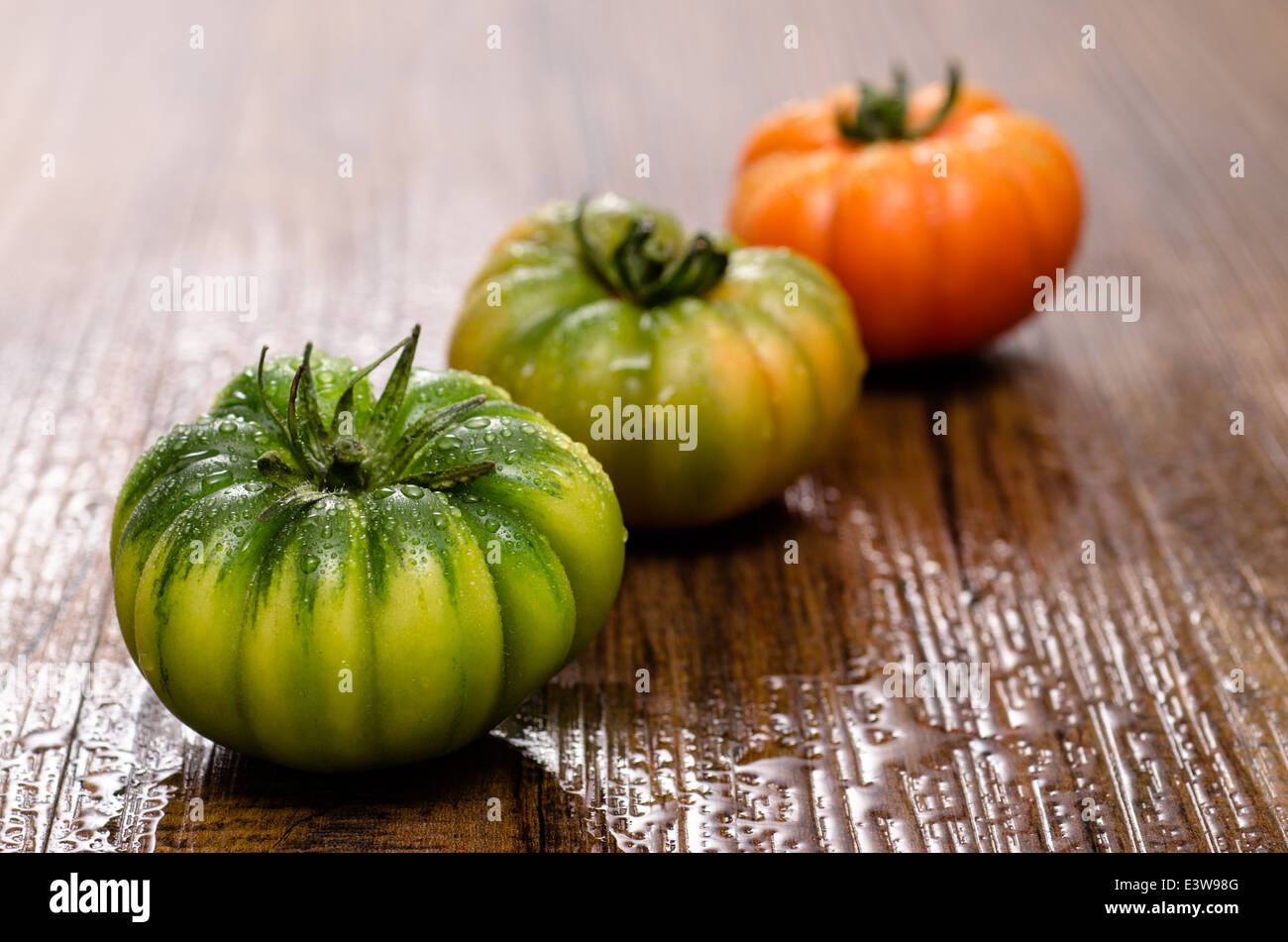 Red and green italian bovine heart tomatoes Stock Photo - Alamy
