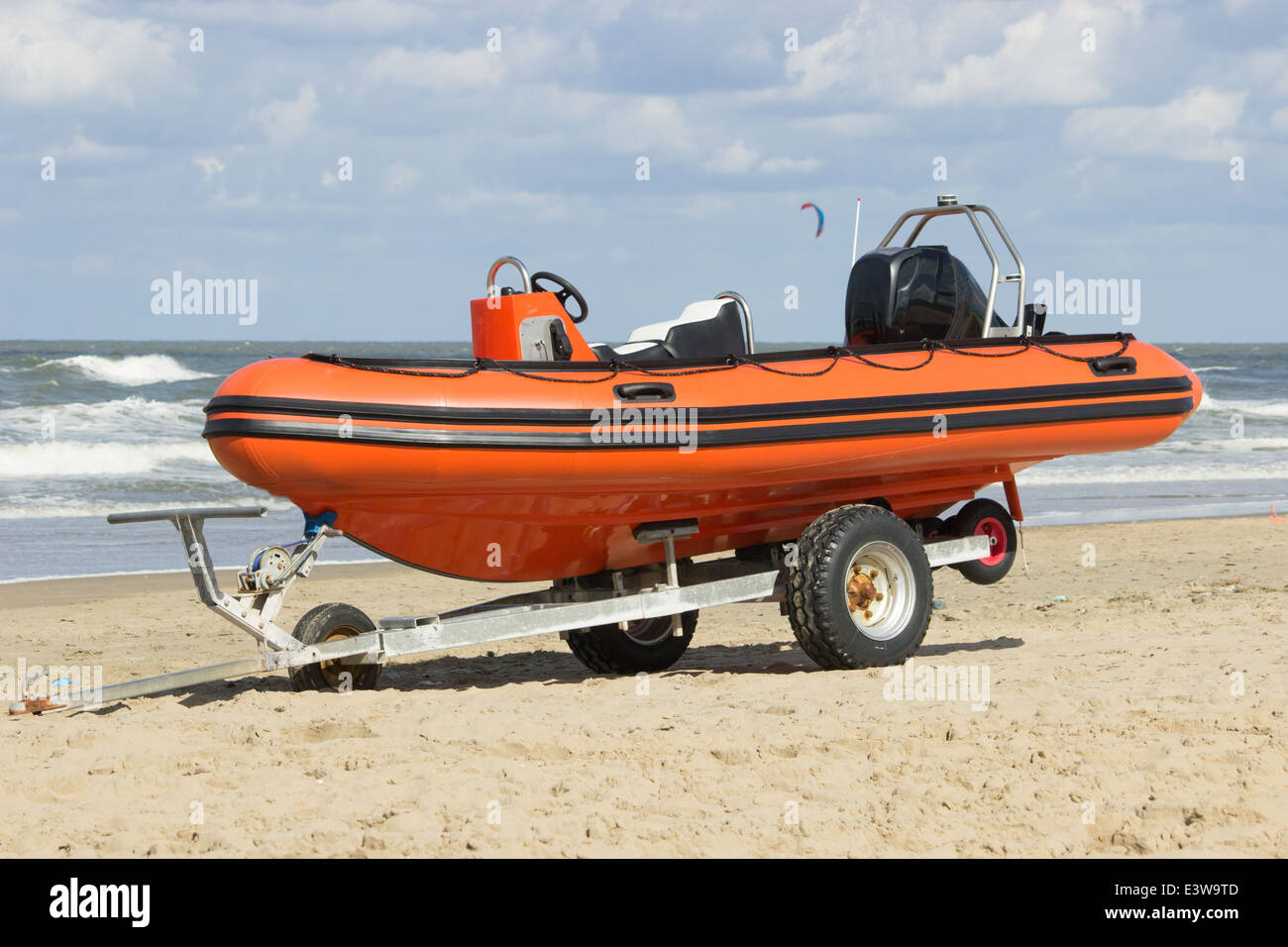 Boat for emergency services on trailer on the beach Stock Photo - Alamy