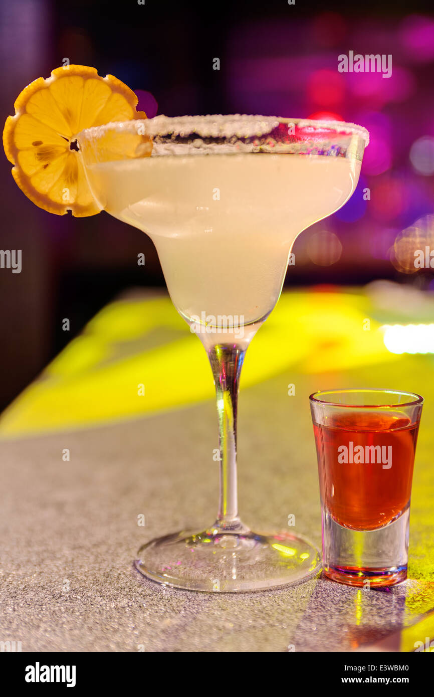 cocktail at bar in a night club with vivid colors Stock Photo - Alamy