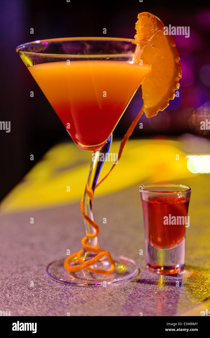 cocktail at bar in a night club with vivid colors Stock Photo - Alamy