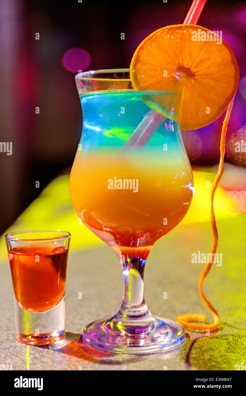 cocktail at bar in a night club with vivid colors Stock Photo - Alamy