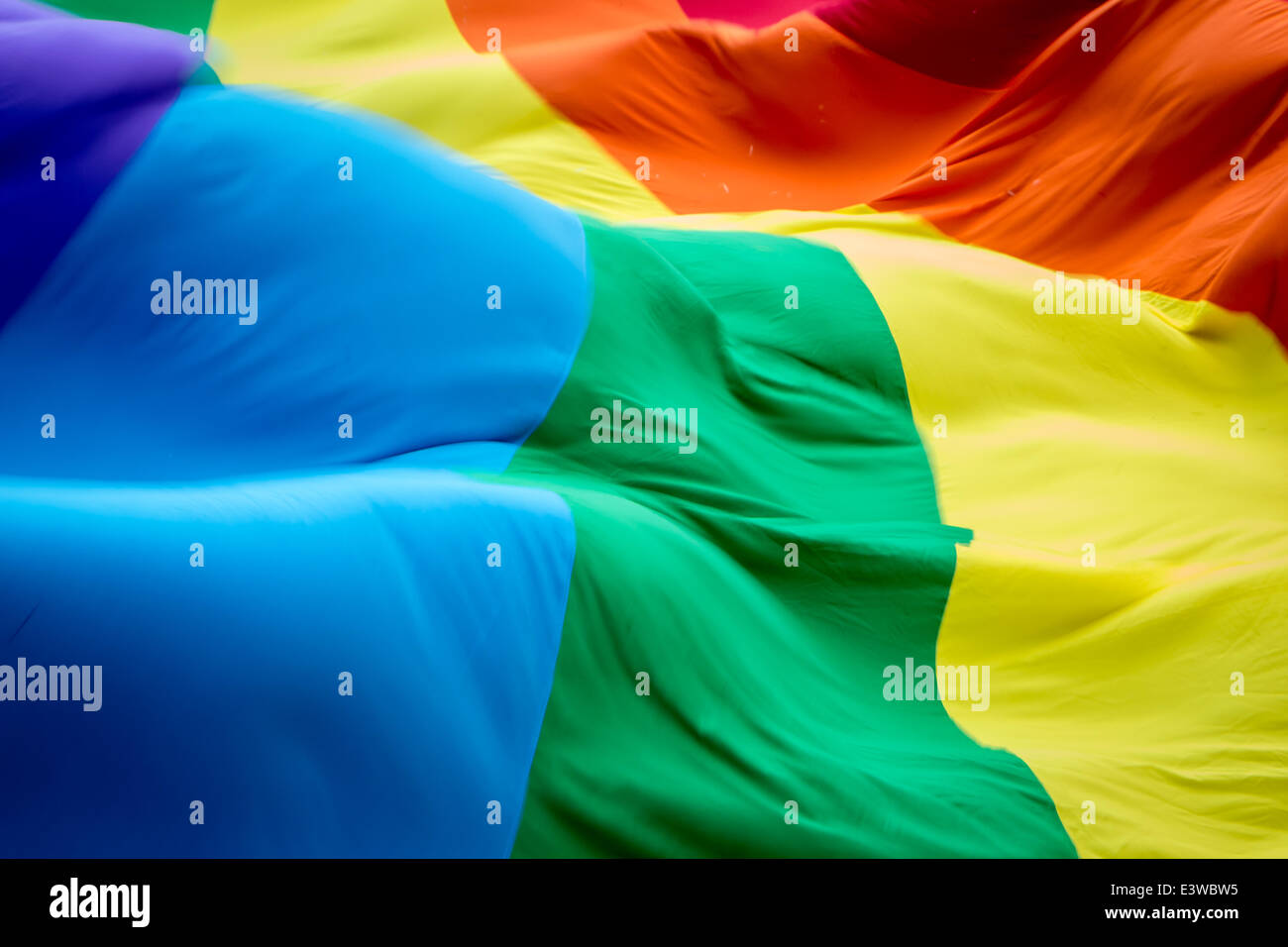 close up of a rainbow flag at Pride in London 2014 Stock Photo - Alamy
