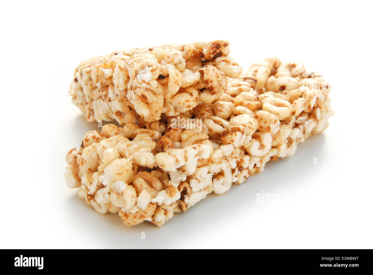 two pieces sweet rice puffs blocks on a white background Stock Photo ...