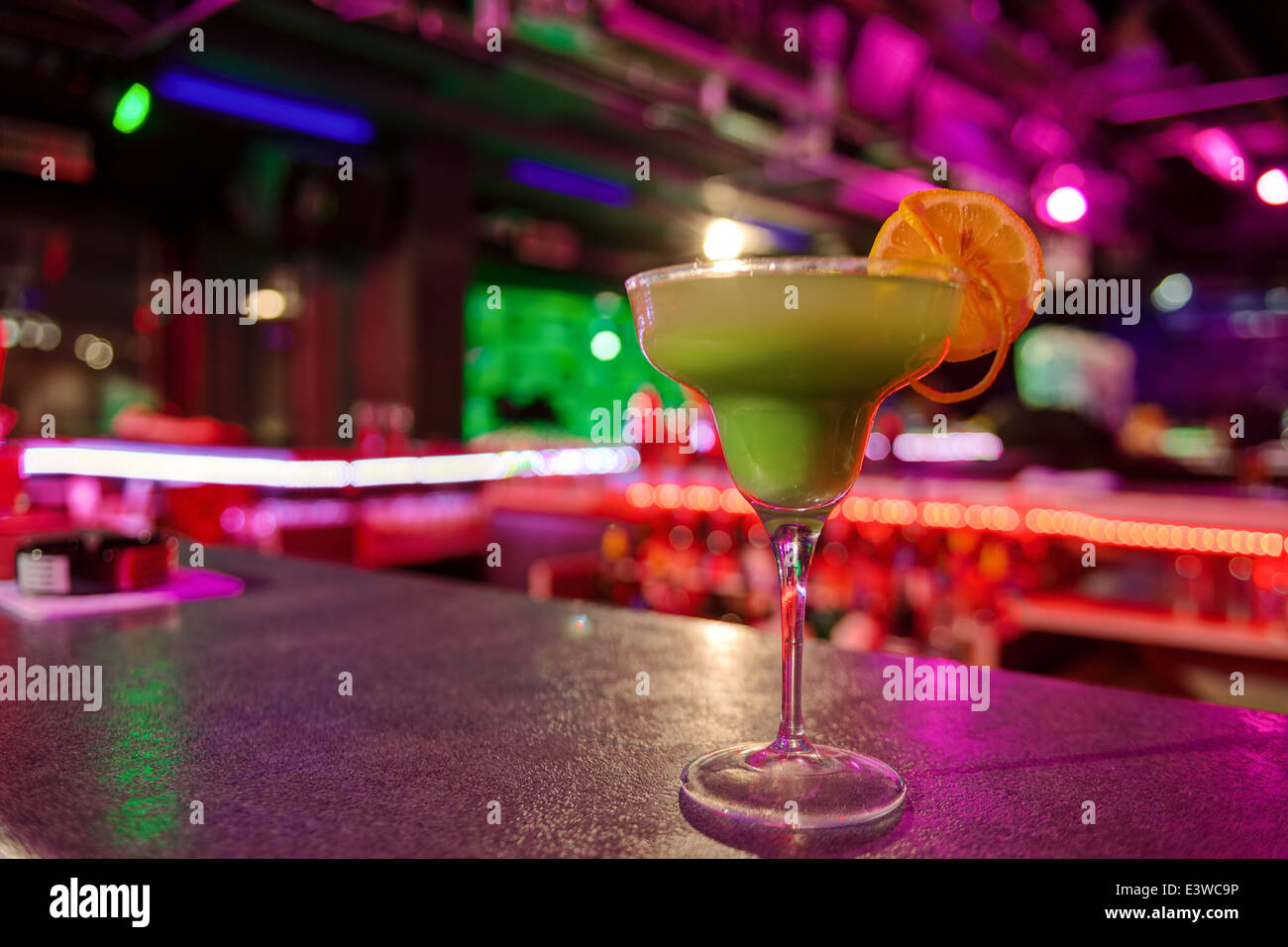cocktail at bar in a night club with vivid colors Stock Photo - Alamy