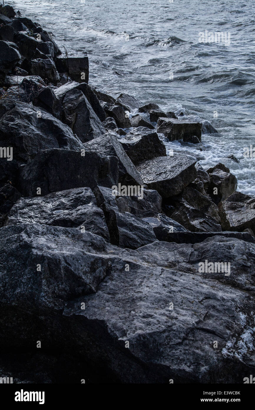 Rocks by the seashore Stock Photo - Alamy