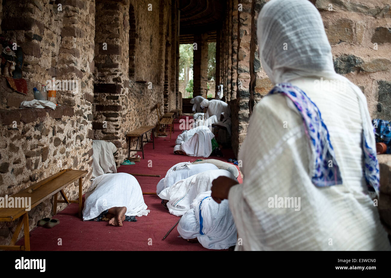 Orthodox women are praying the Ethiopian way ( by lying on the ground ...