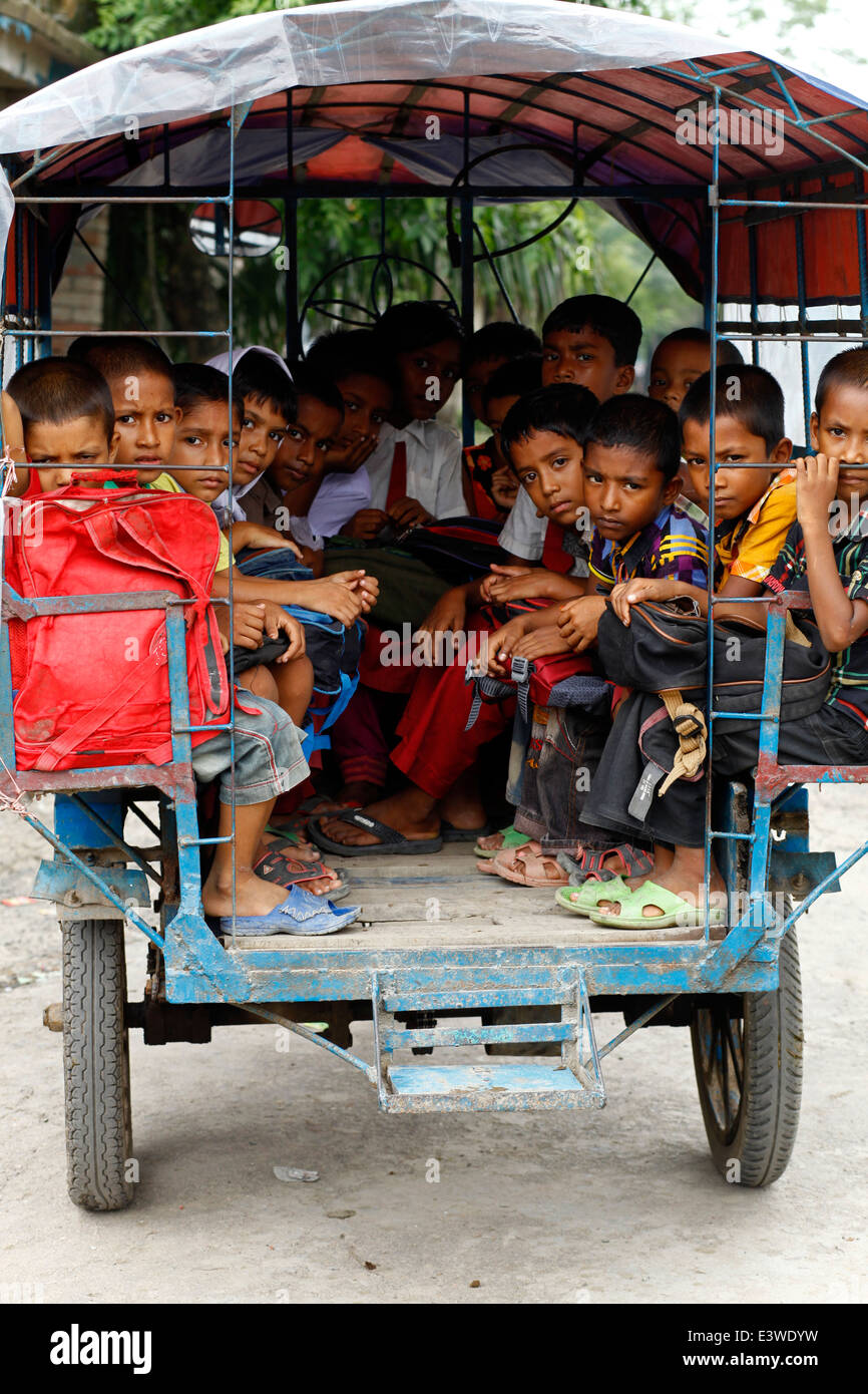 Schoold children back home after school by school van.Primary education ...