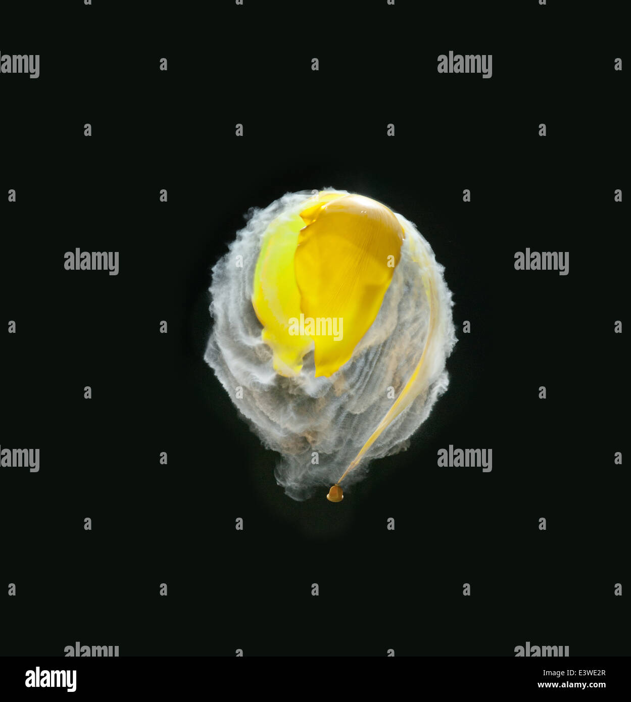 high speed flash capturing bursting balloon and visible sound wave ...