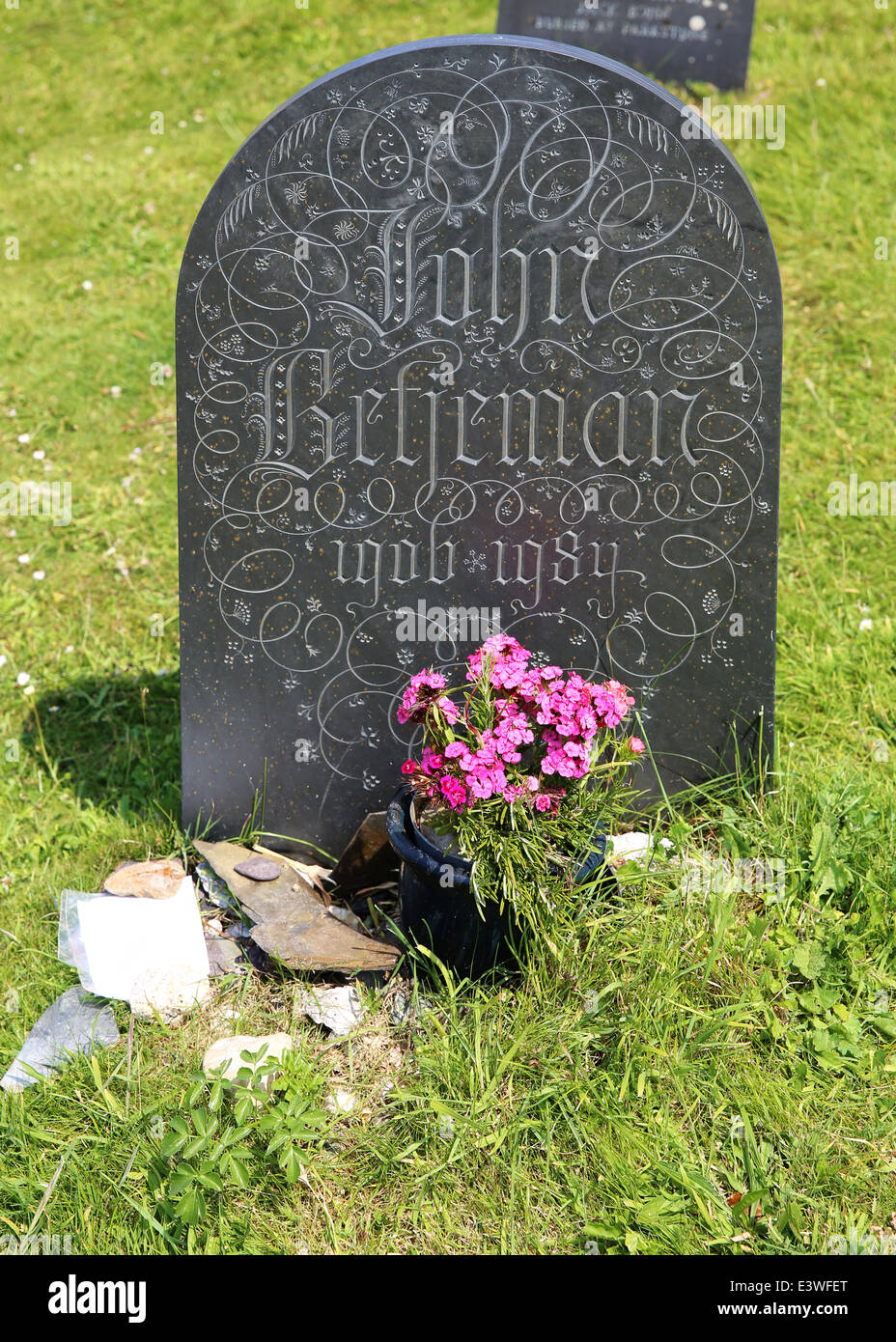 The headstone of poet John Betjeman's grave in St Enedoc's churchyard ...