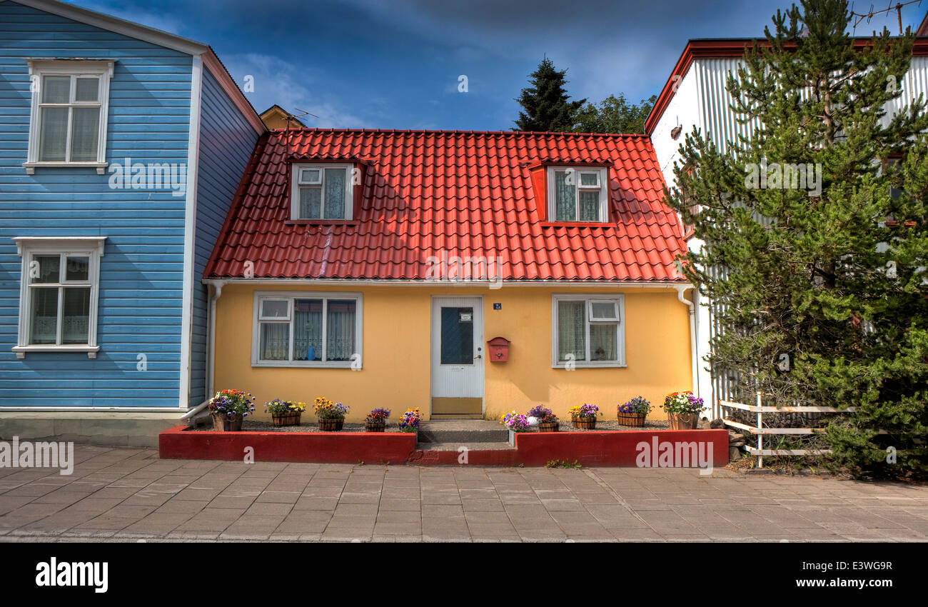Small house painted yellow with a red roof, Akureyri, Iceland Stock ...