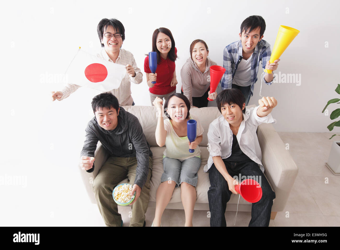 Japanese supporters cheering Stock Photo - Alamy
