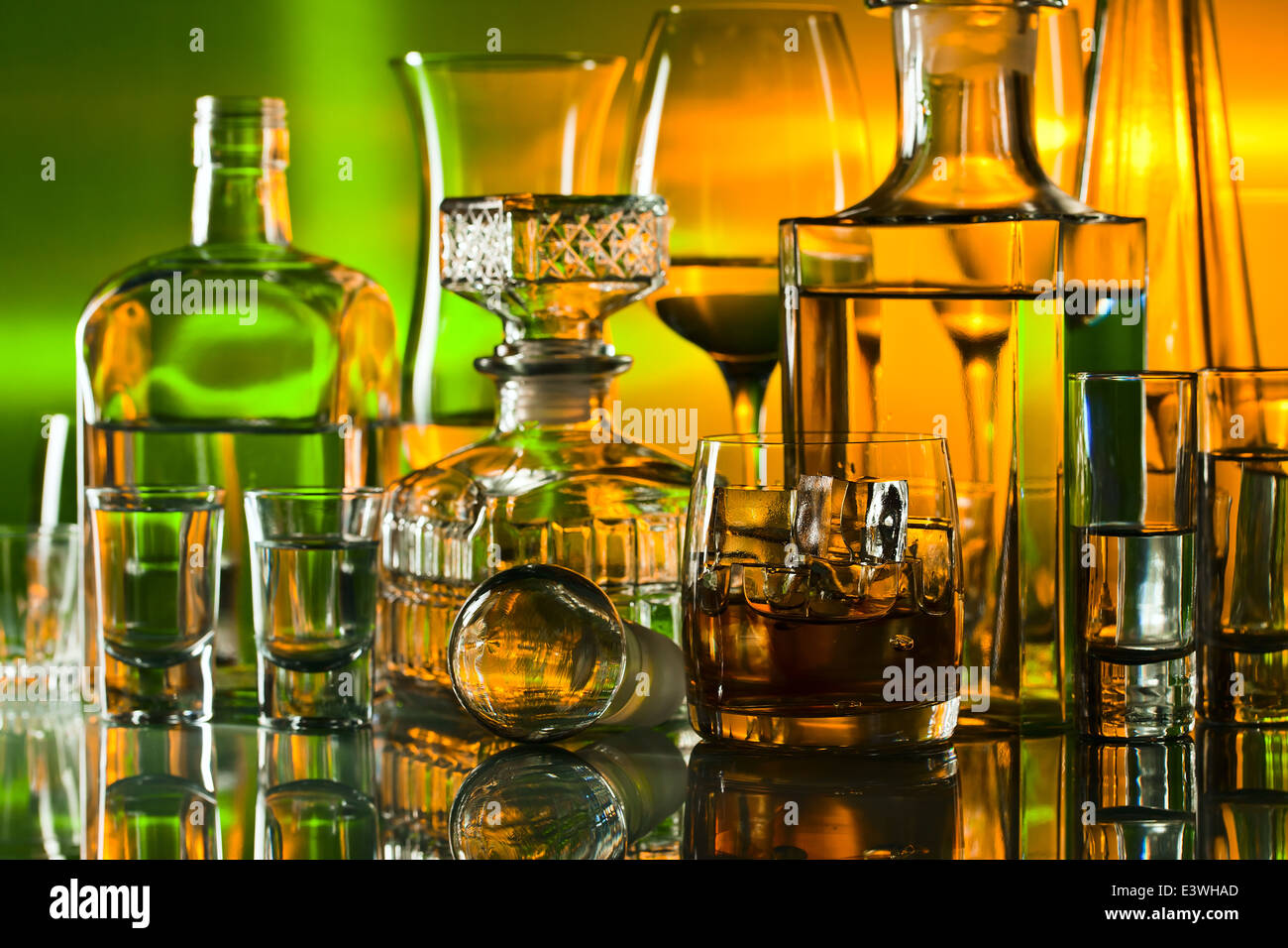 alcoholic drinks in bar on glass table Stock Photo - Alamy