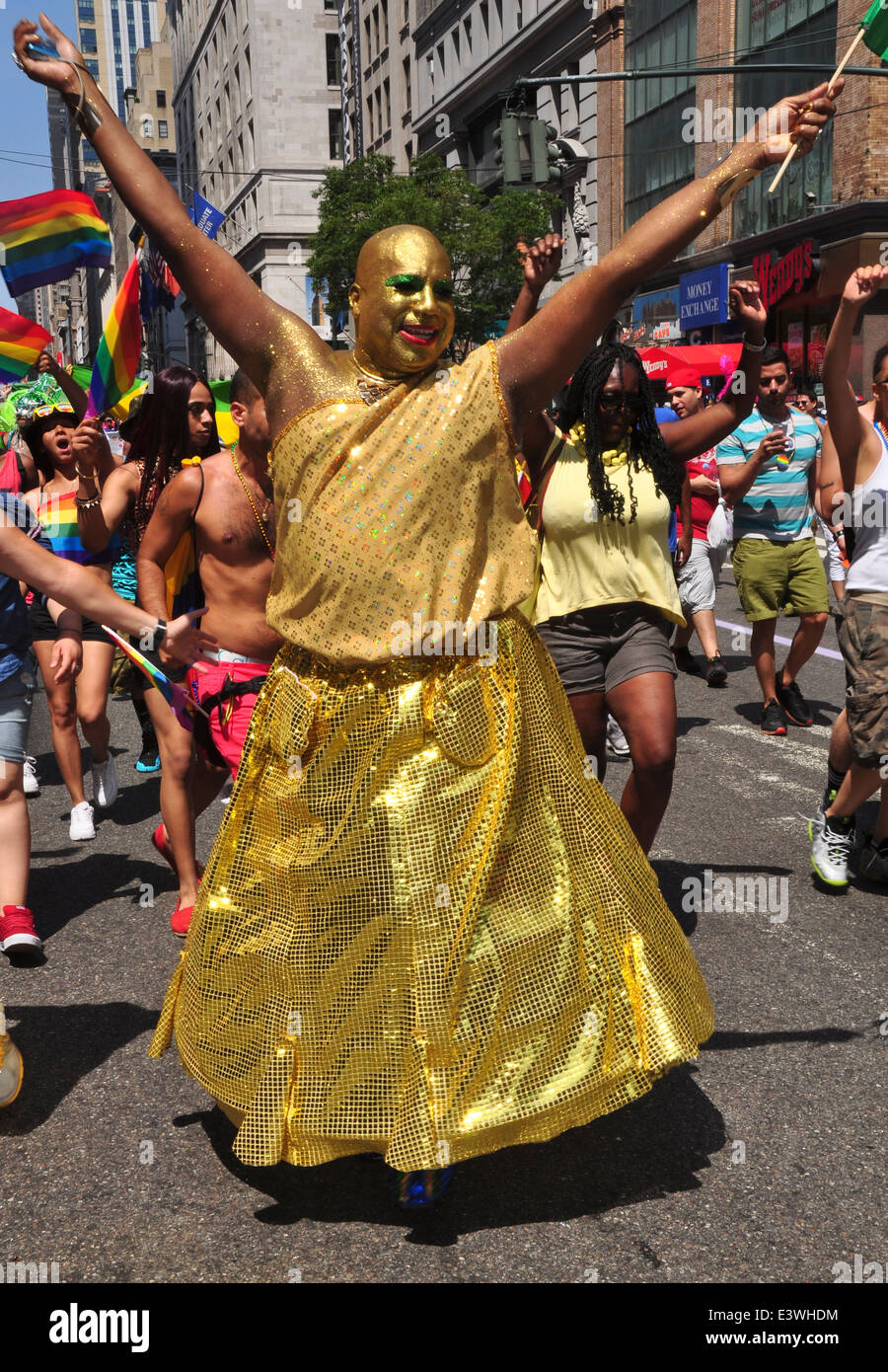 NYC: Exuberant gilded man marching in the 2014 Gay Pride Parade on ...