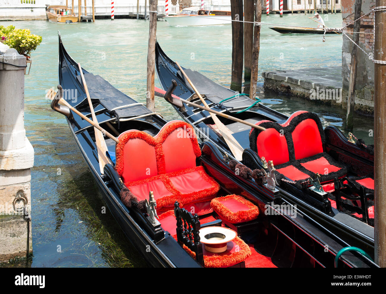 Ancient gondolas boat in Venice. Gondola red color interior Stock Photo ...