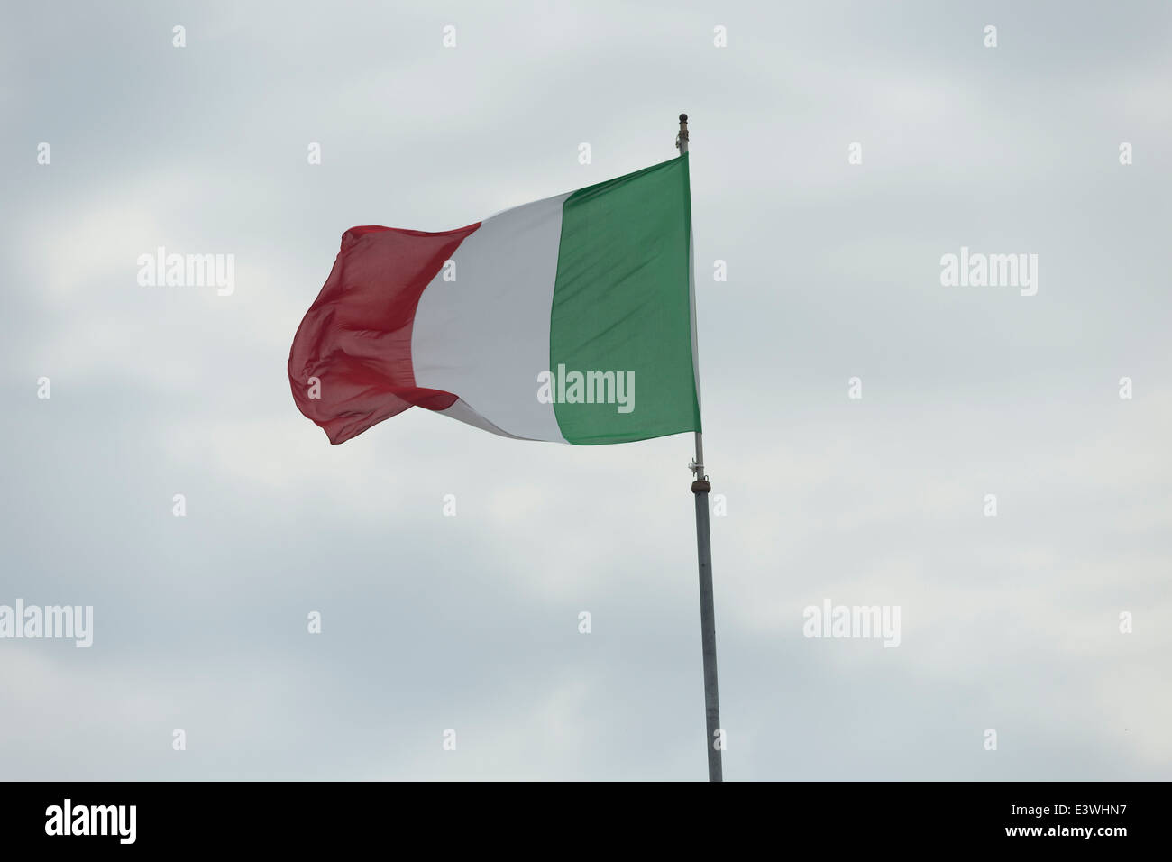 Italian flag blowing in the wind: red, white and green Stock Photo - Alamy