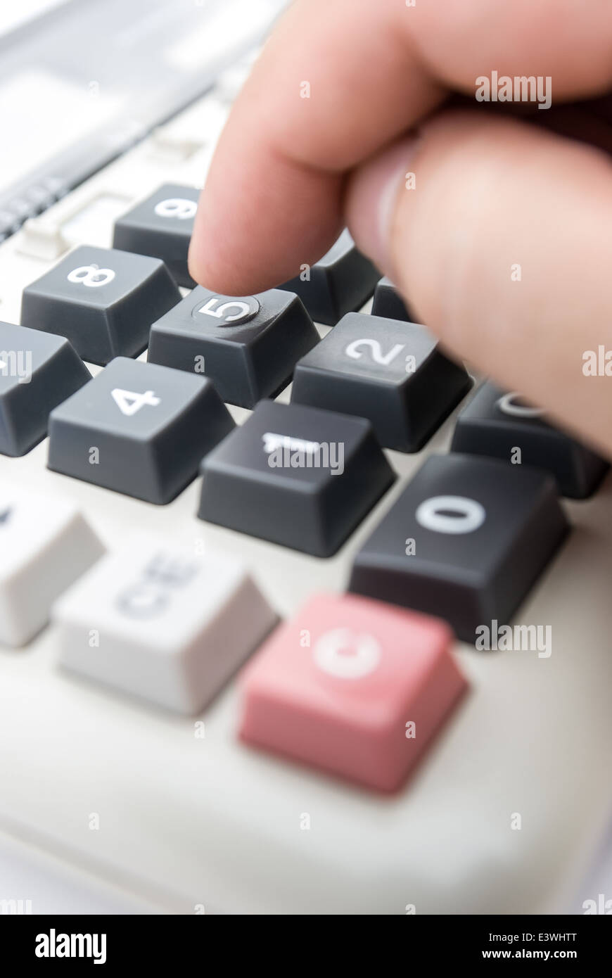 using a calculator Stock Photo - Alamy