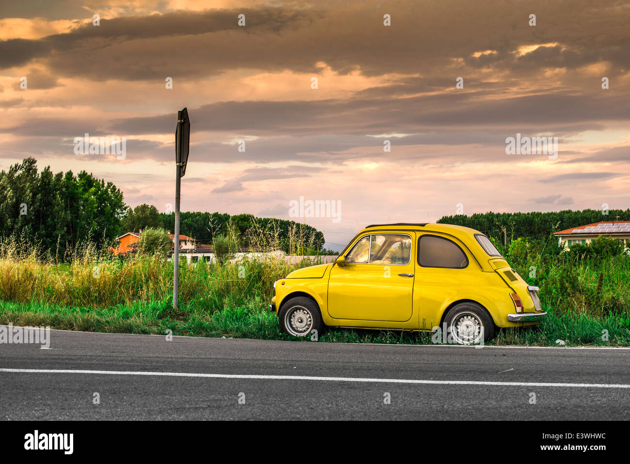 Small vintage italian car Fiat Abarth. Yellow color Stock Photo - Alamy