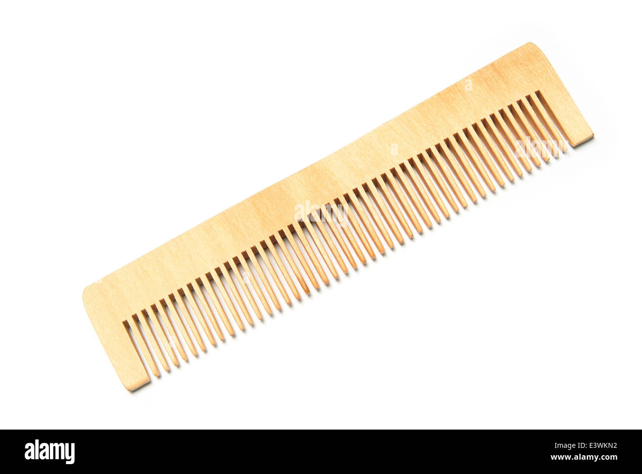 wooden comb on a white background Stock Photo - Alamy
