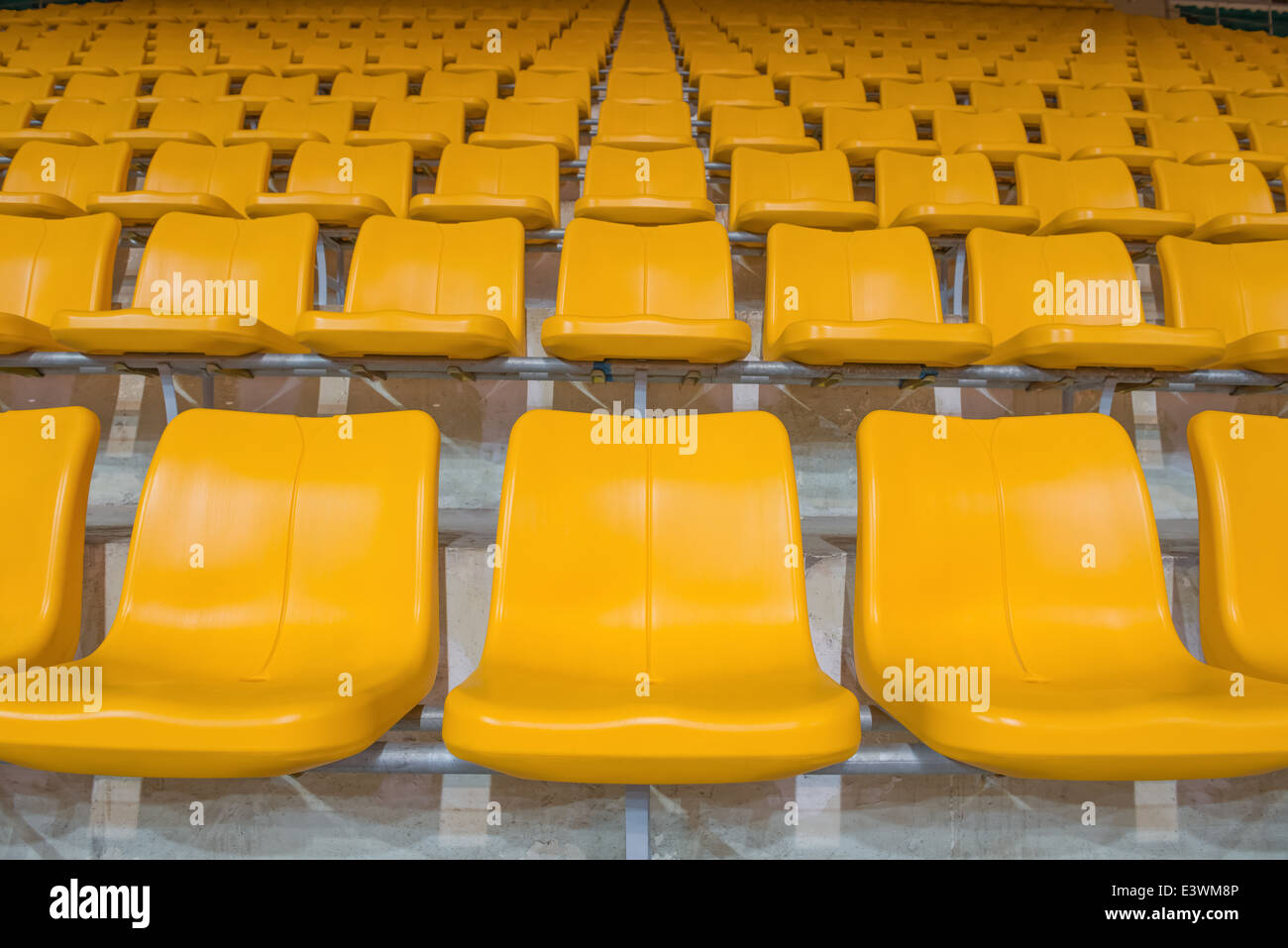 yellow stadium seats Stock Photo - Alamy