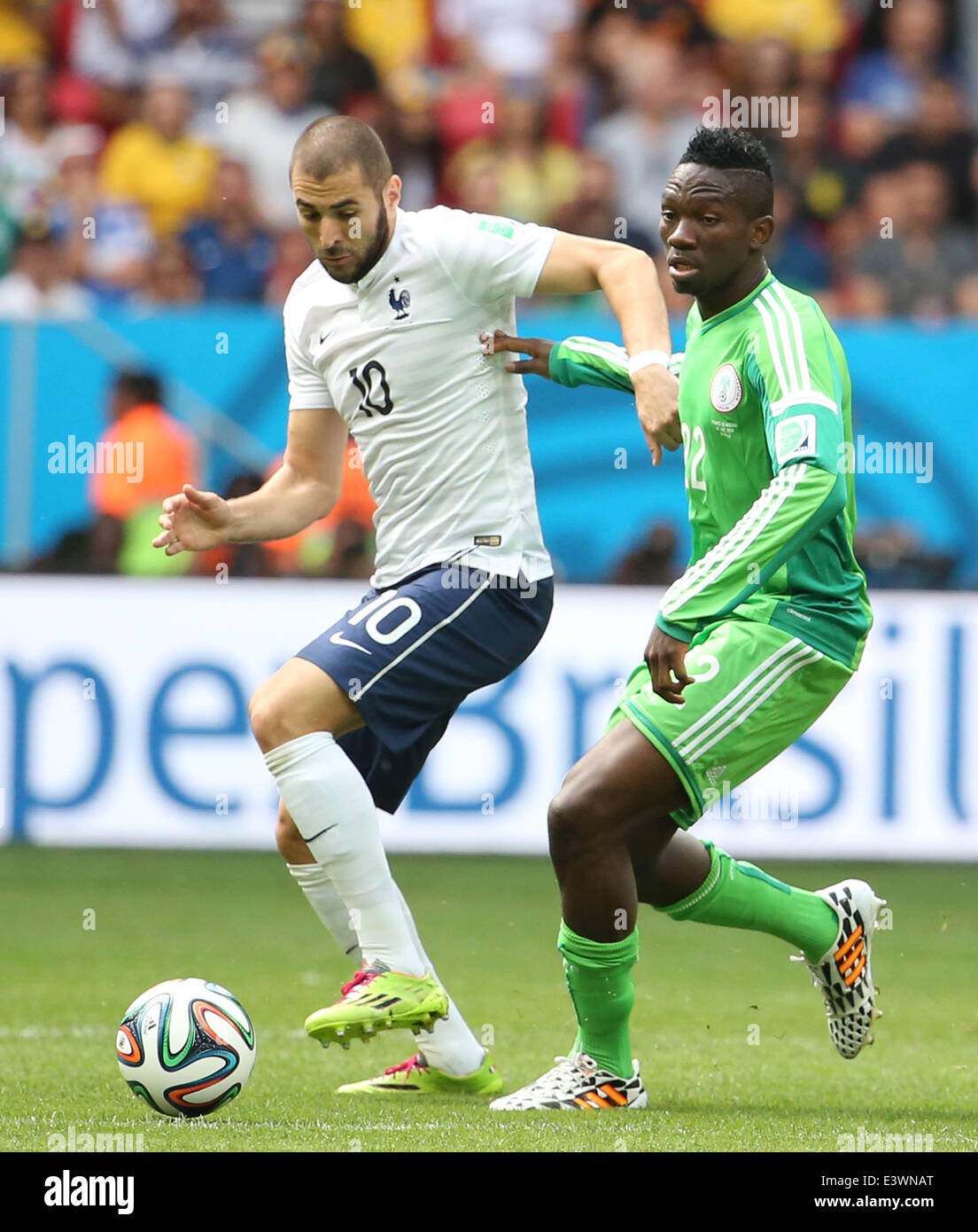 Brasilia, Brazil. 30th June, 2014. France's Karim Benzema vies with ...