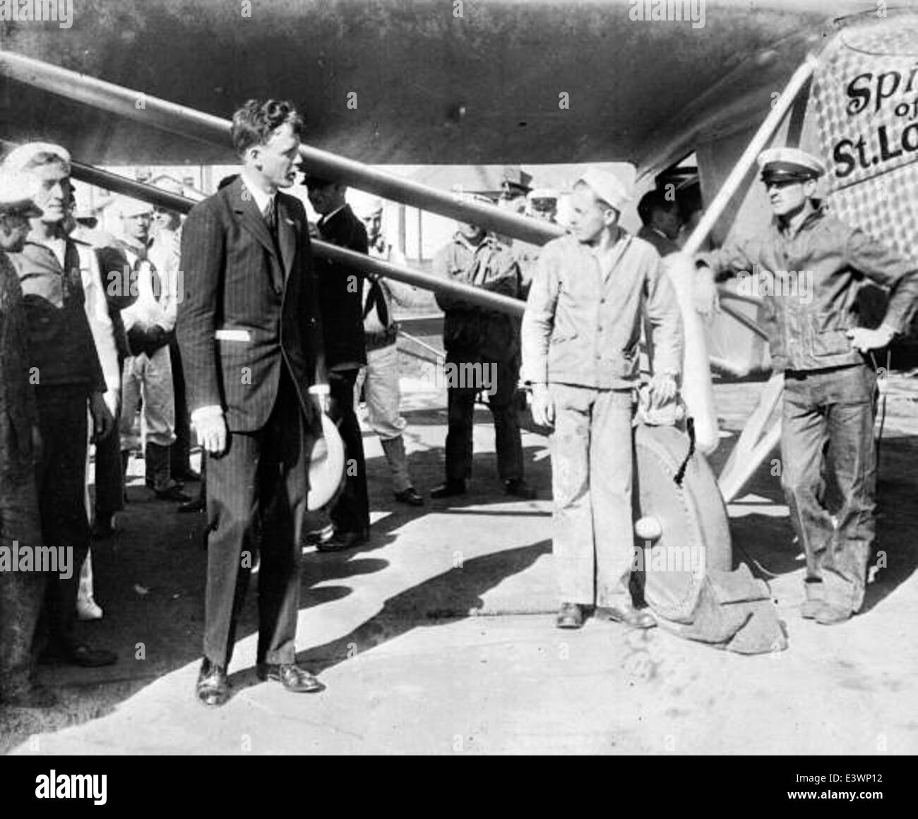 This photograph features Charles Lindbergh with the Spirit of St. Louis ...