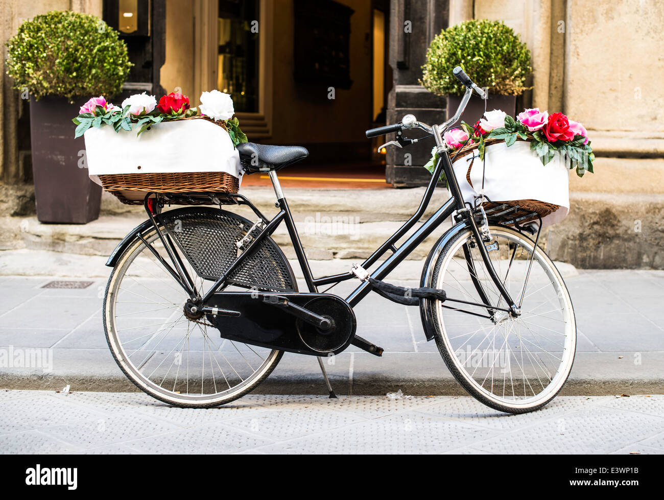 Italian vintage bicycle. Bike with flowers Stock Photo - Alamy