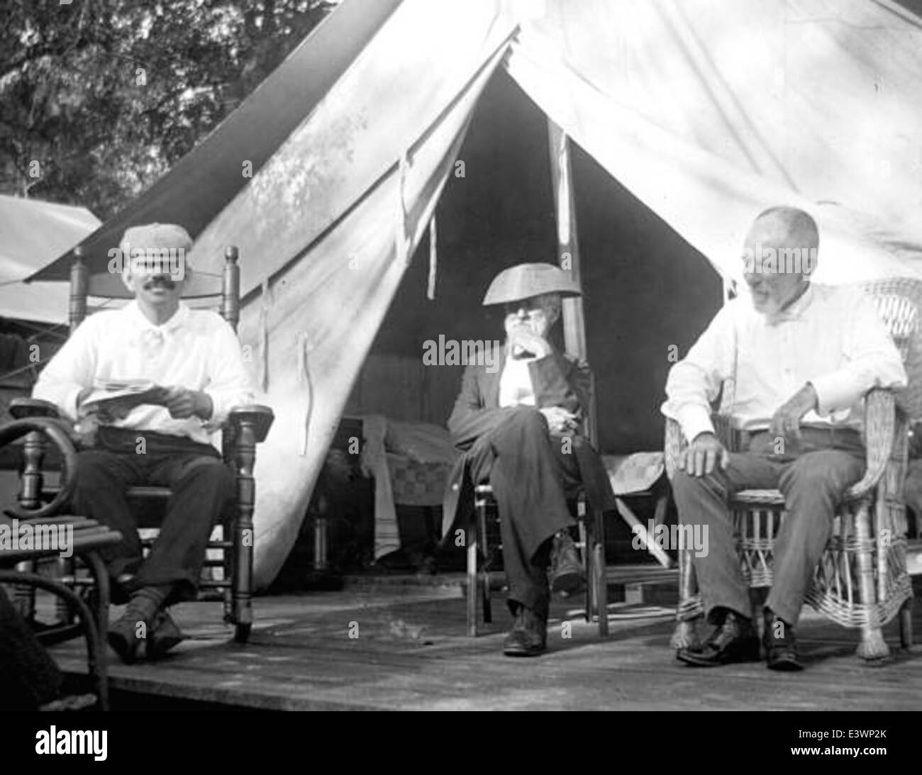 A group of people enjoying a comfortable camping experience near ...